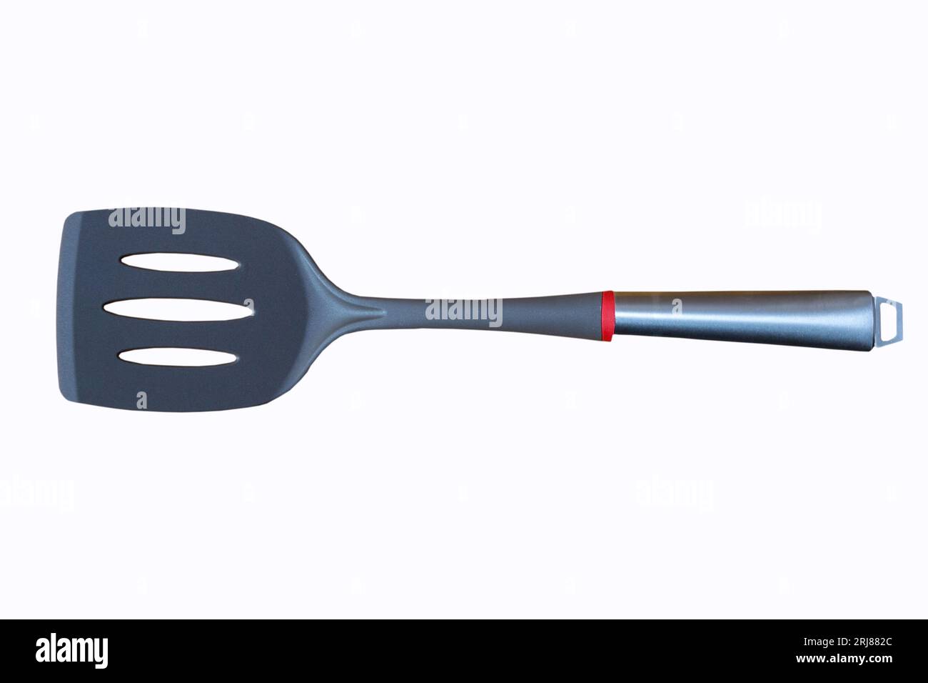 Gray spatula for frying in a frying pan on a white background Stock ...