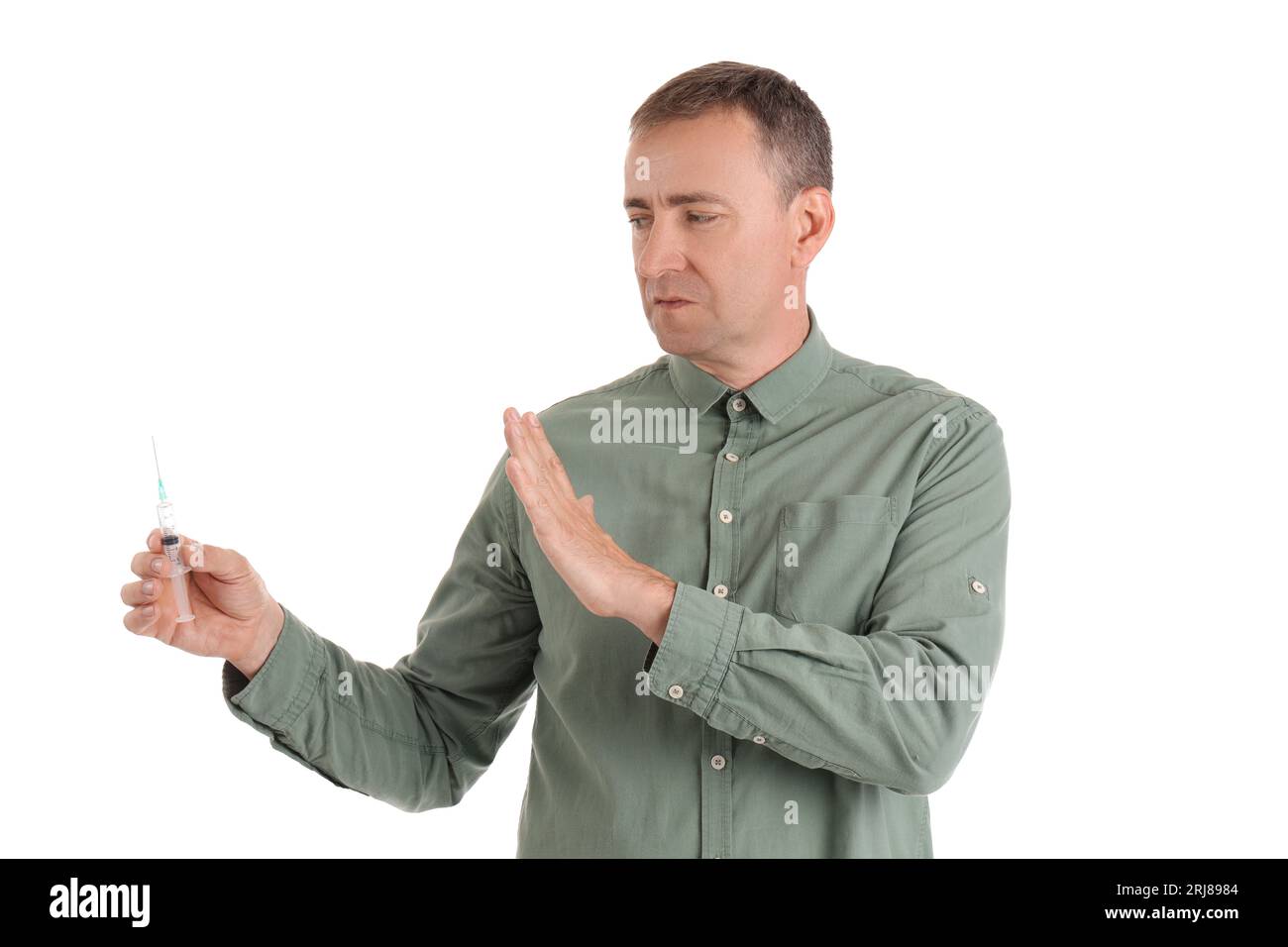 Mature drug addict rejecting syringe on white background Stock Photo ...