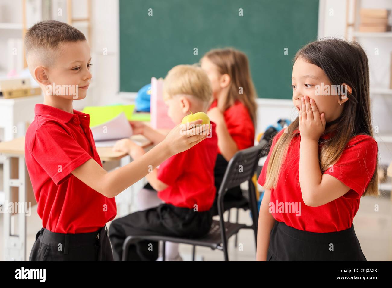 Little children in classroom at school Stock Photo - Alamy