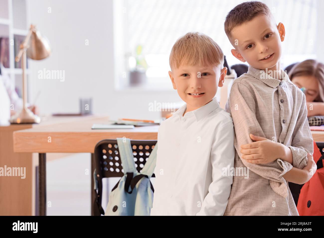 Little boys in classroom at school Stock Photo - Alamy