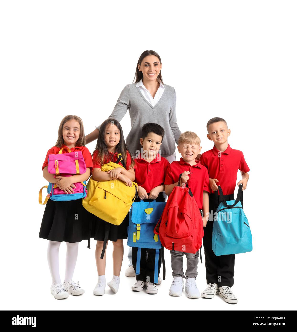 Little school children with female teacher on white background Stock ...