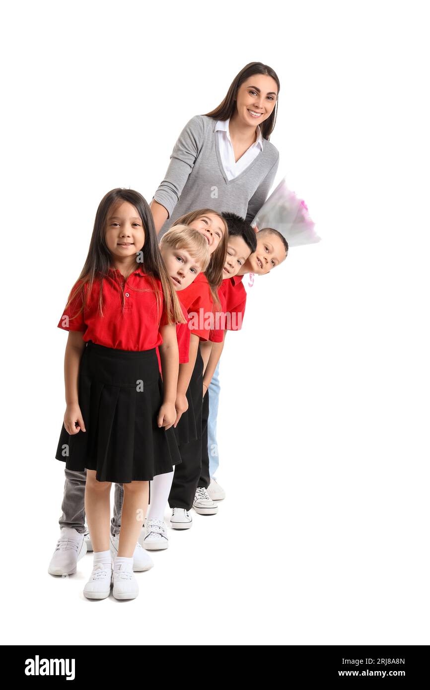 Little school children with female teacher on white background Stock ...