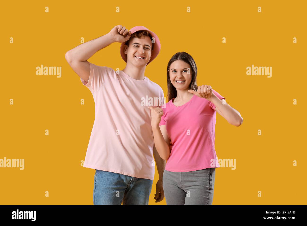 People wear yellow shirts hi-res stock photography and images - Alamy