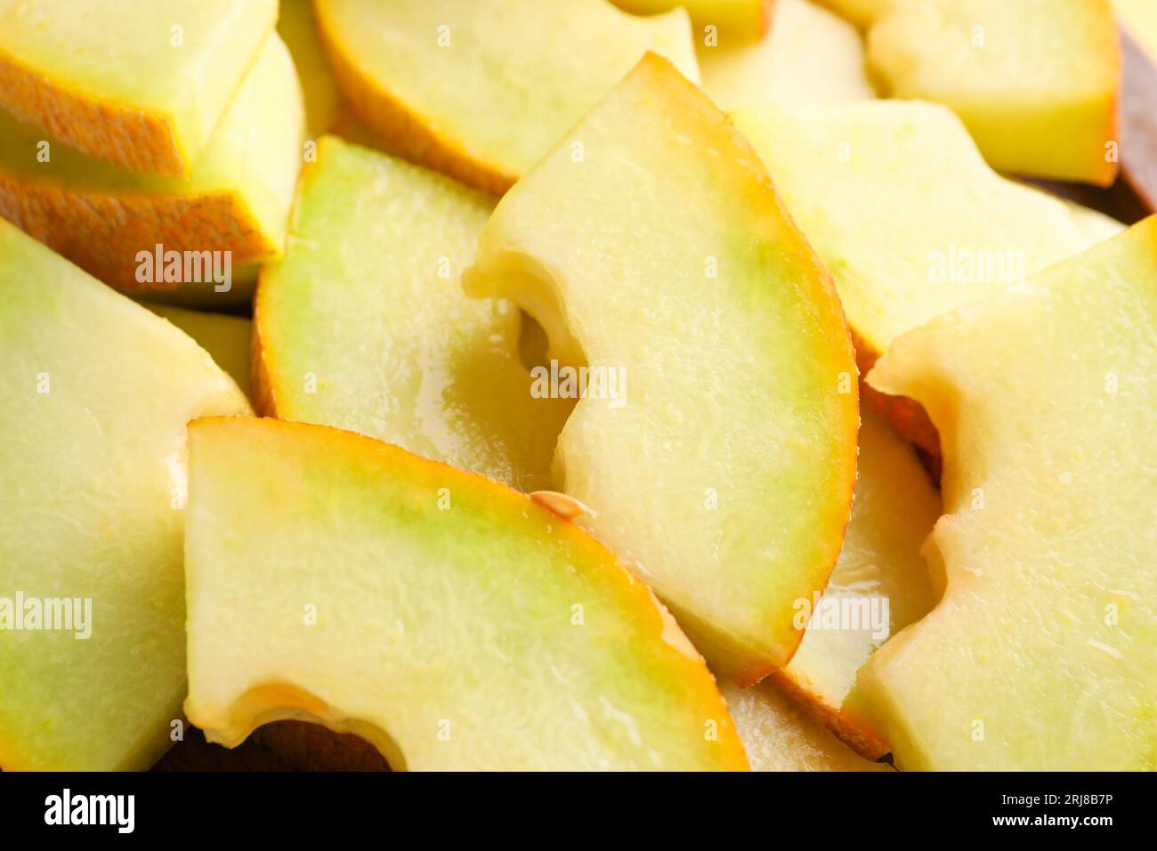 Texture of sweet cut melons as background Stock Photo - Alamy