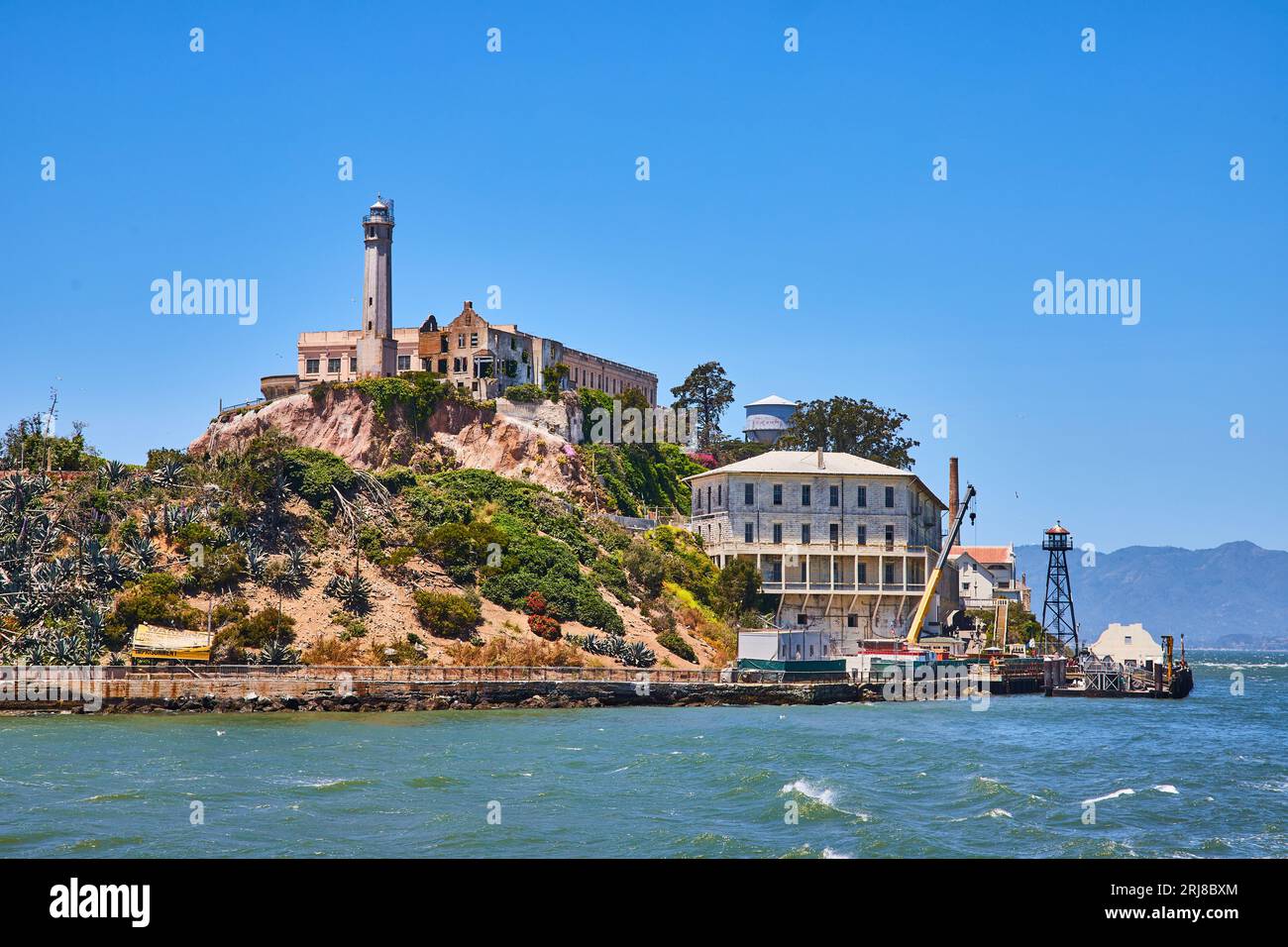 Alcatraz Island close up view of shoreline with Alcatraz Lighthouse on ...