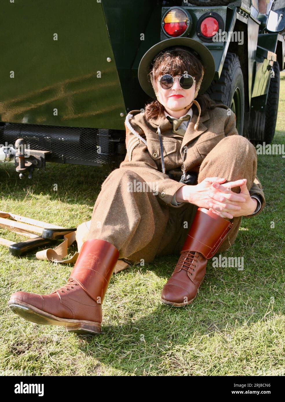 A tired soldier, exhausted from the days events, at the 1940's Wartime ...