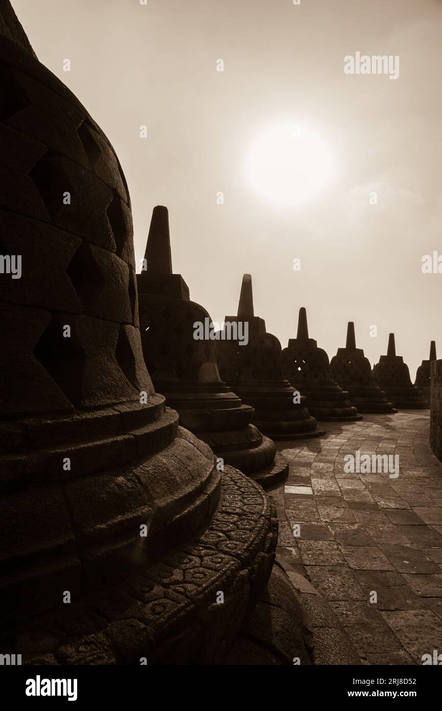 Borobudur on Java, Indonesia, at dawn, with stupa and multiple stupas ...