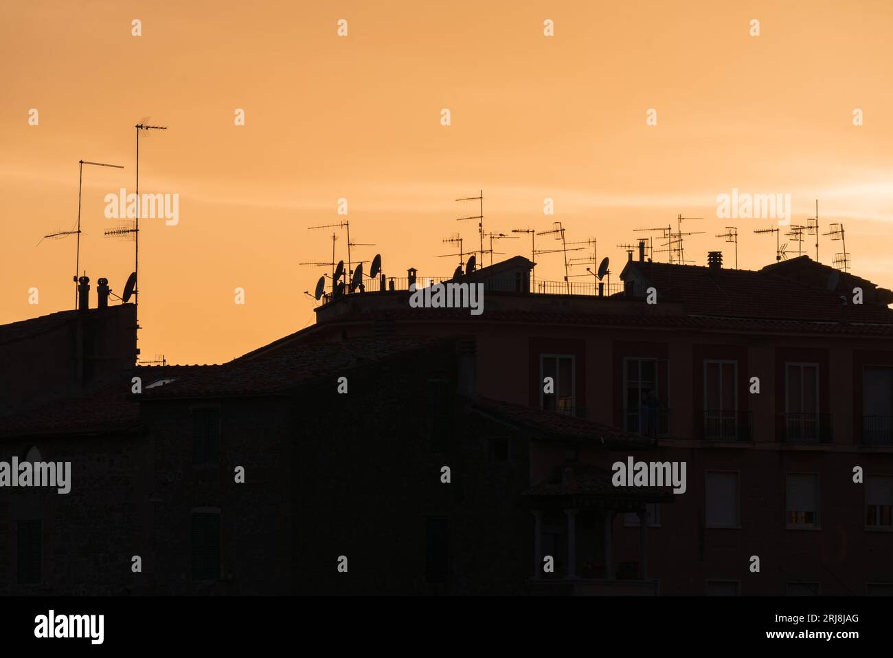 European historical ancient city skyline, rooftops with antenna ...