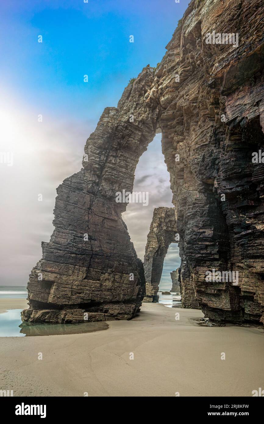 Famous eroded arches of Las Catedrales beach in Ribadeo, Lugo, Galicia ...