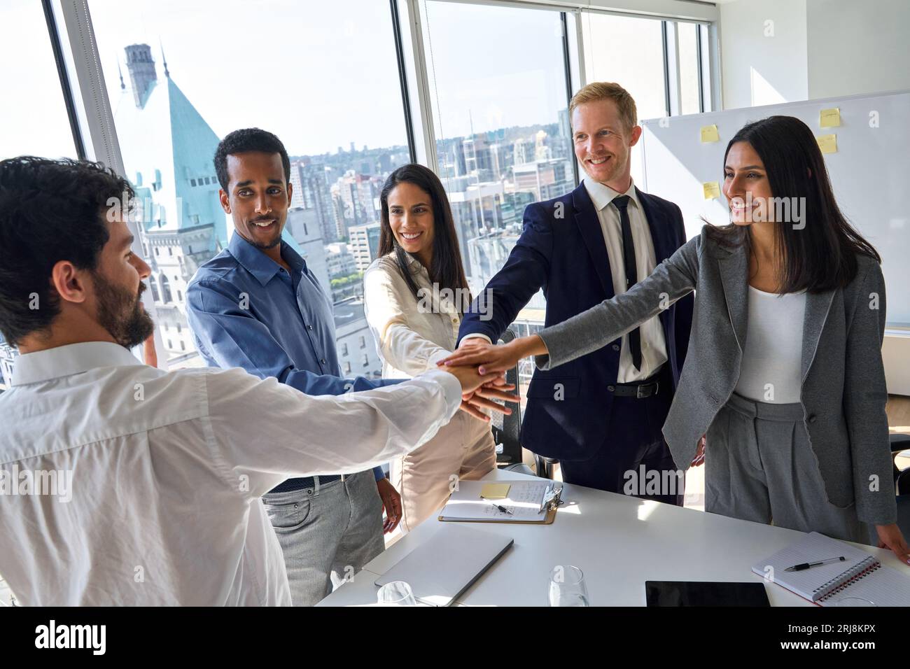 Business people joining hands in circle hi-res stock photography and ...