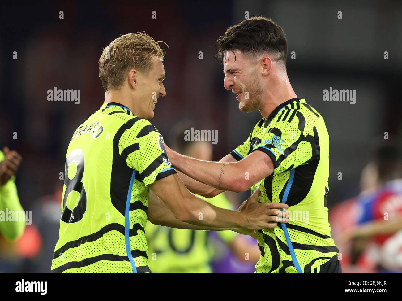 London, UK. 21st Aug, 2023. Martin Odegaard and Declan Rice of Arsenal celebrate after the ...