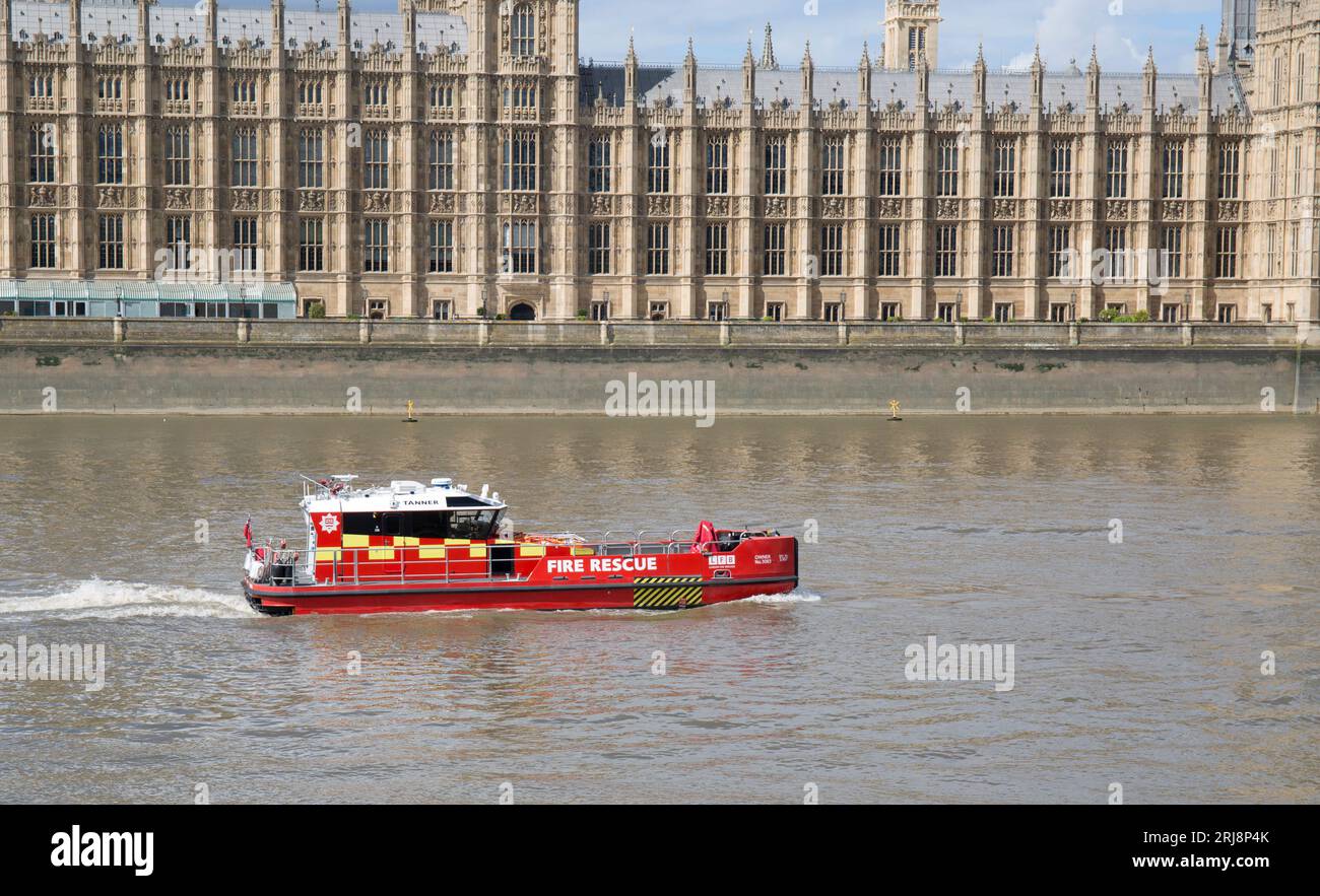 A Fire Rescue Boat Passes Westminster Bridge River Thames City of ...