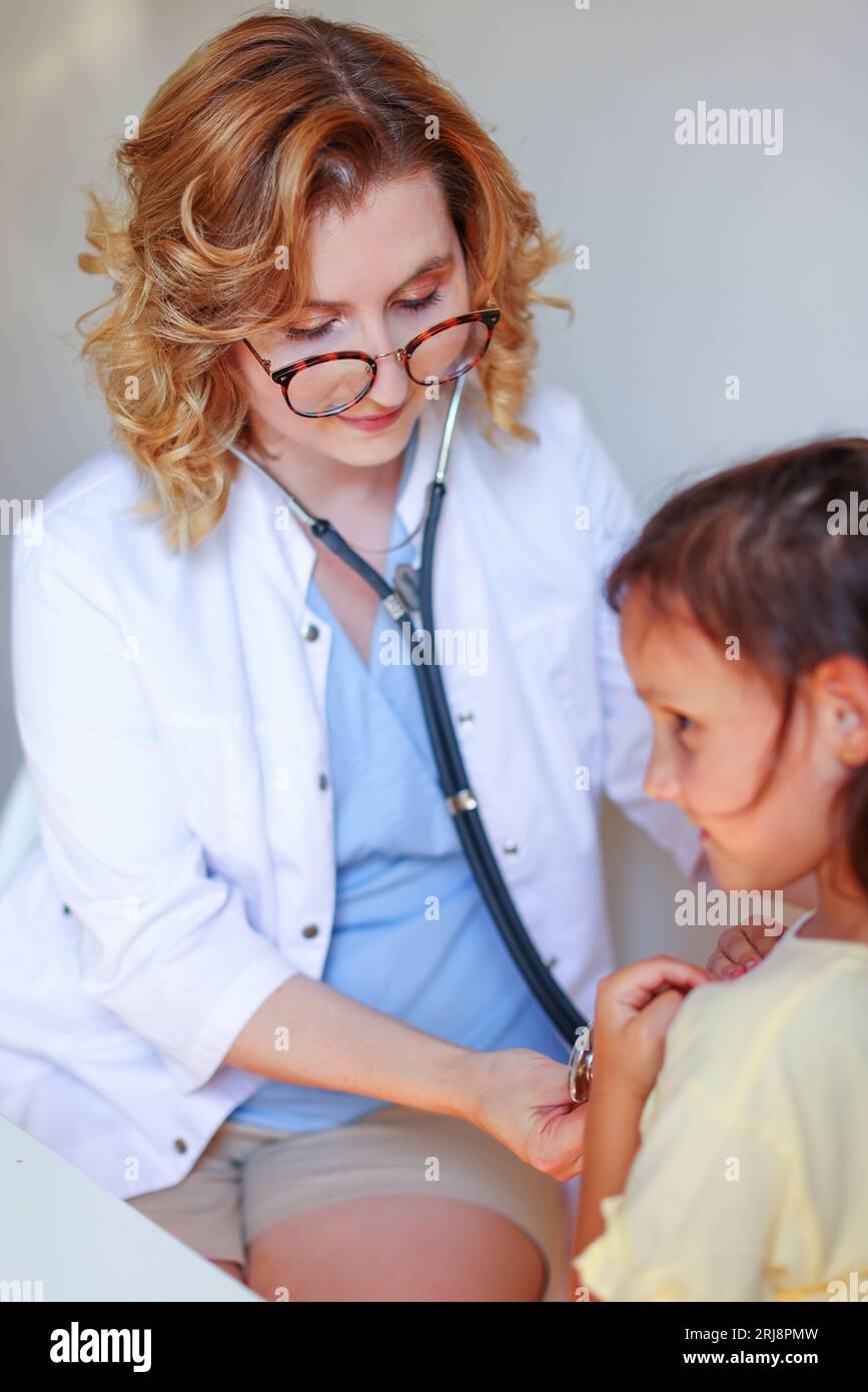 girl make doctor's check-up before school Stock Photo - Alamy