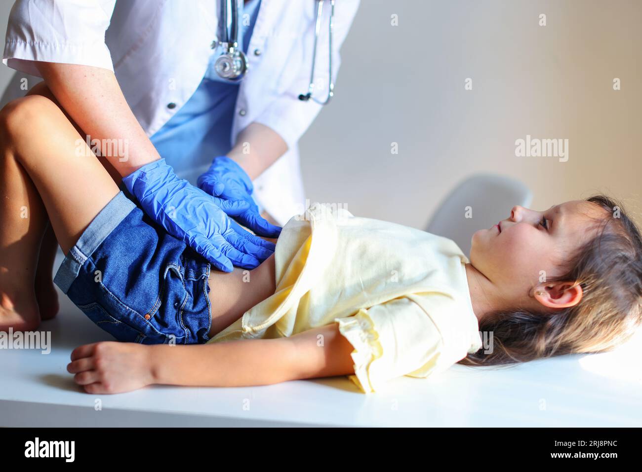 Doctor touch therapy kid hand hi-res stock photography and images - Alamy