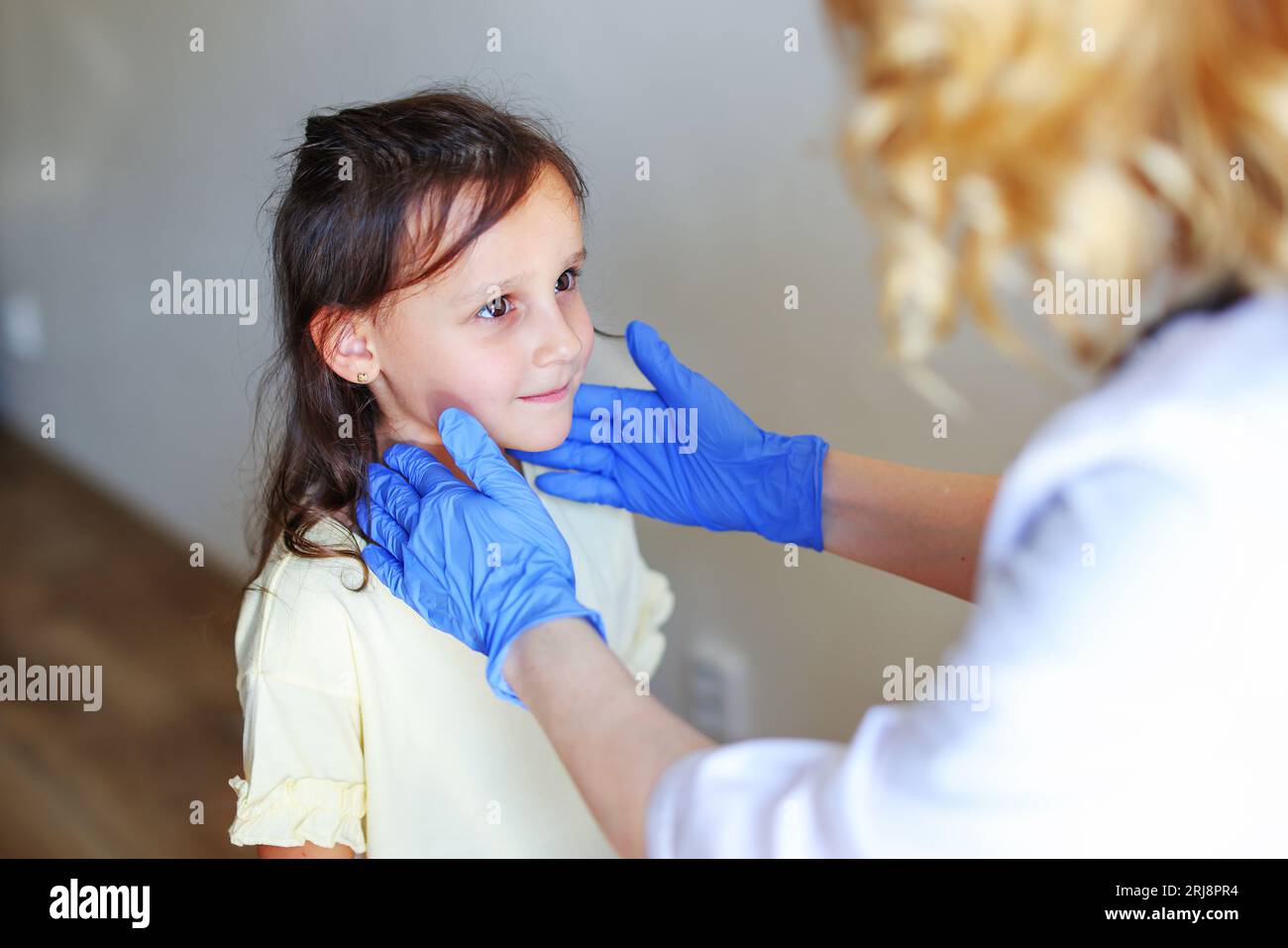 girl make doctor's check-up before school Stock Photo - Alamy