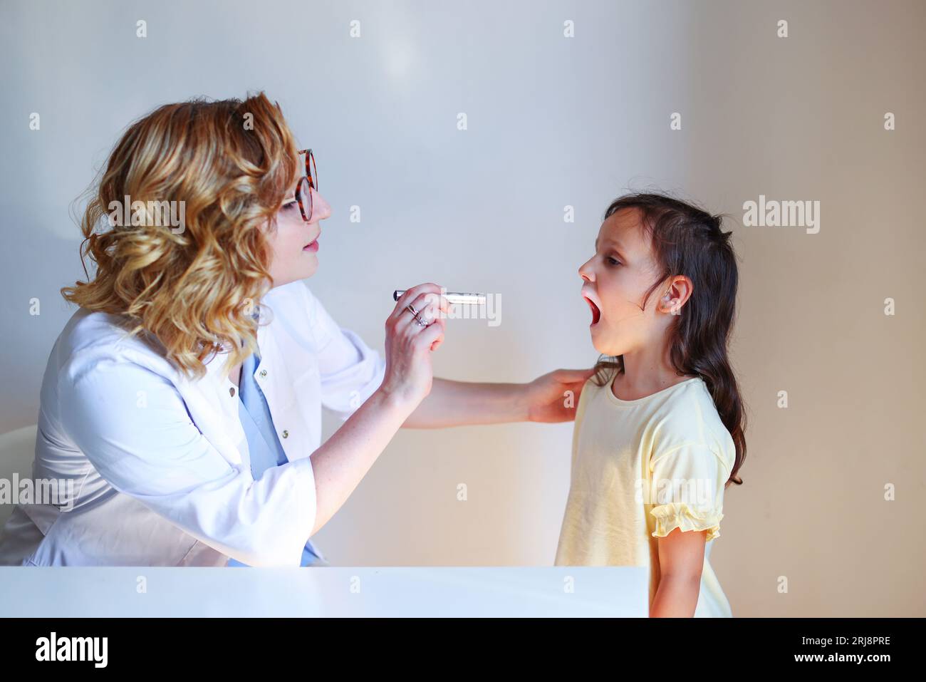 girl make doctor's check-up before school Stock Photo - Alamy