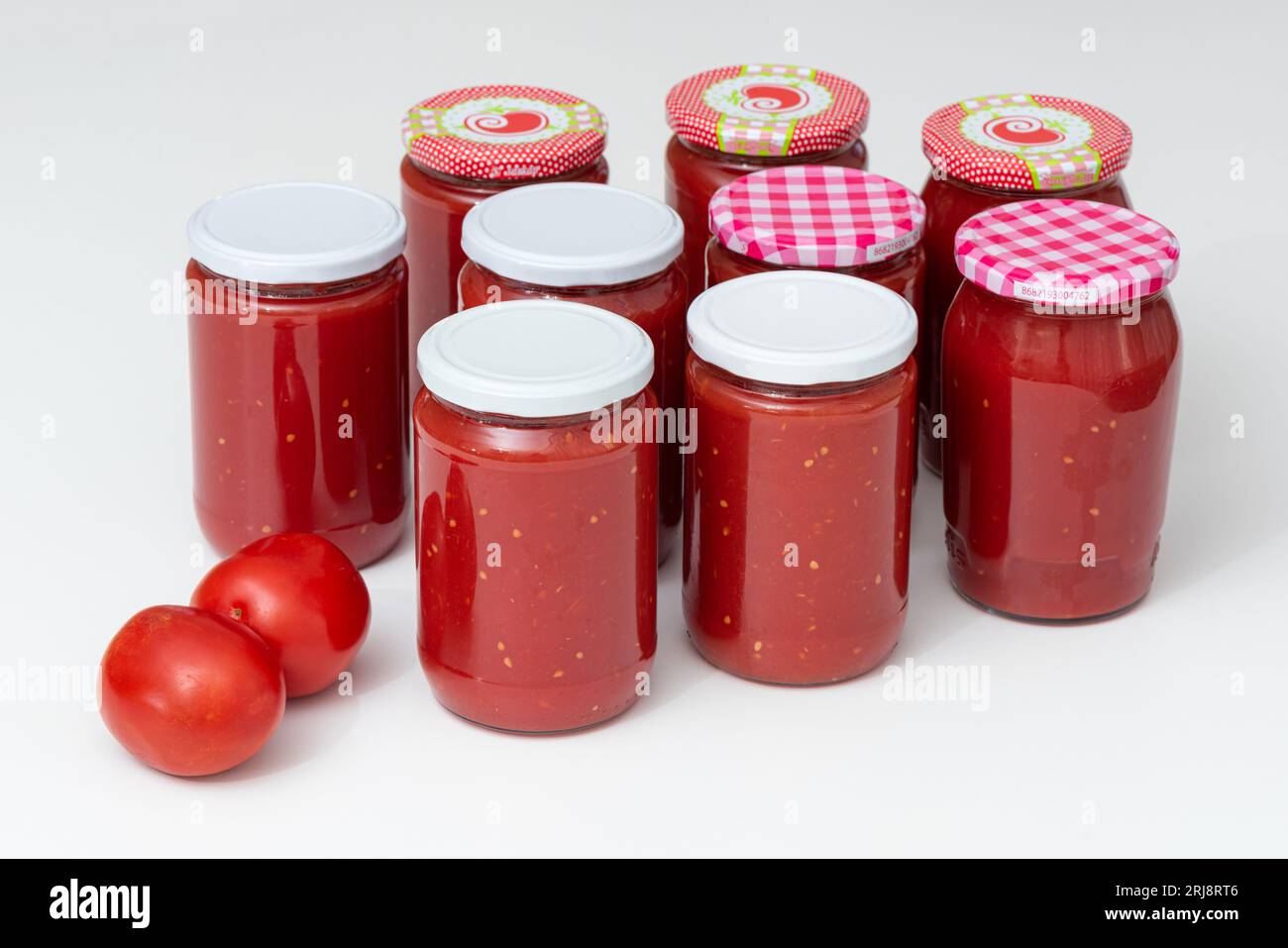 Homemade tomato sauce in the jars traditional prep for the winter ...