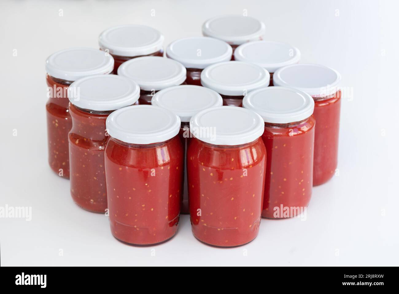 Homemade tomato sauce in the jars traditional prep for the winter ...