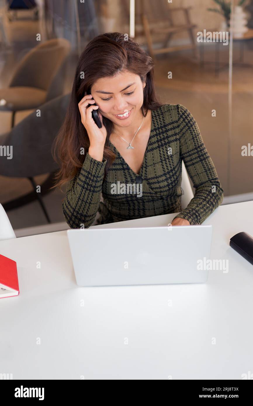 Cheerful lady speaking smartphone on hi-res stock photography and ...