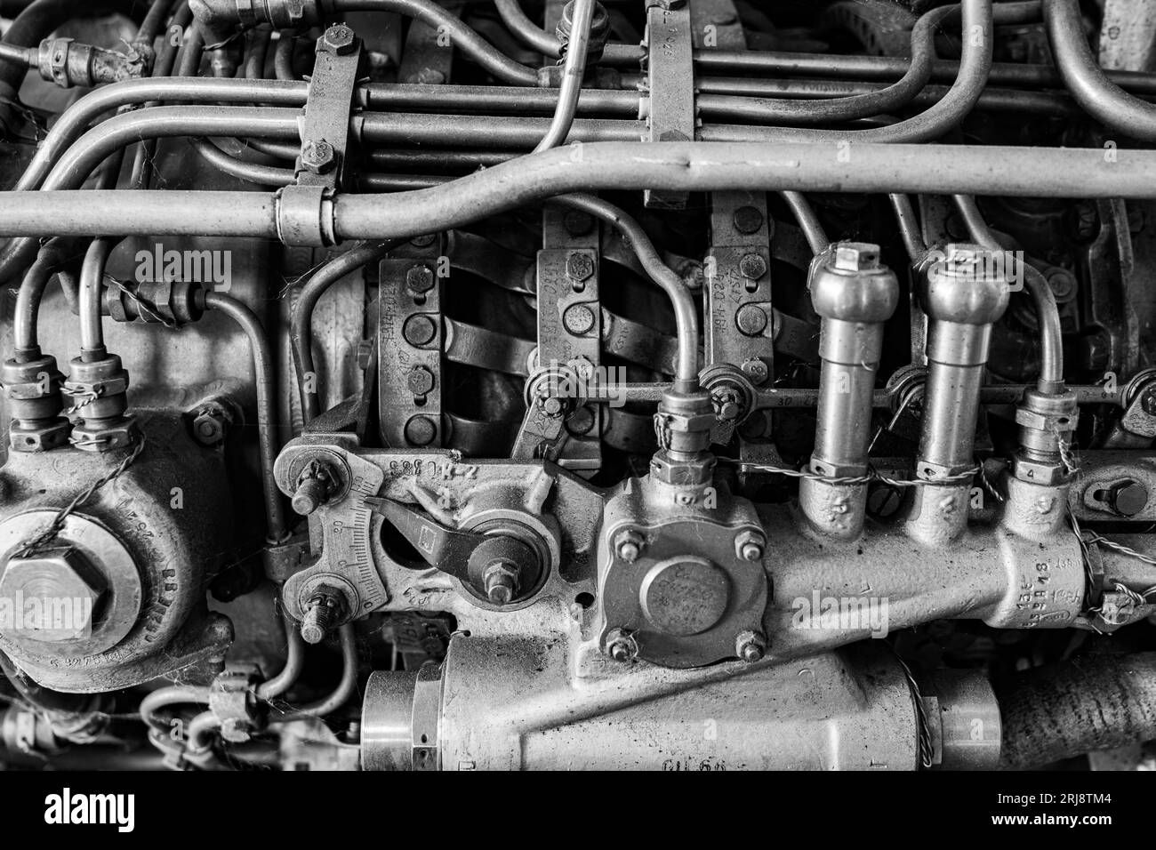 Old car engine fuel delivery system with pressure lines and regulators ...