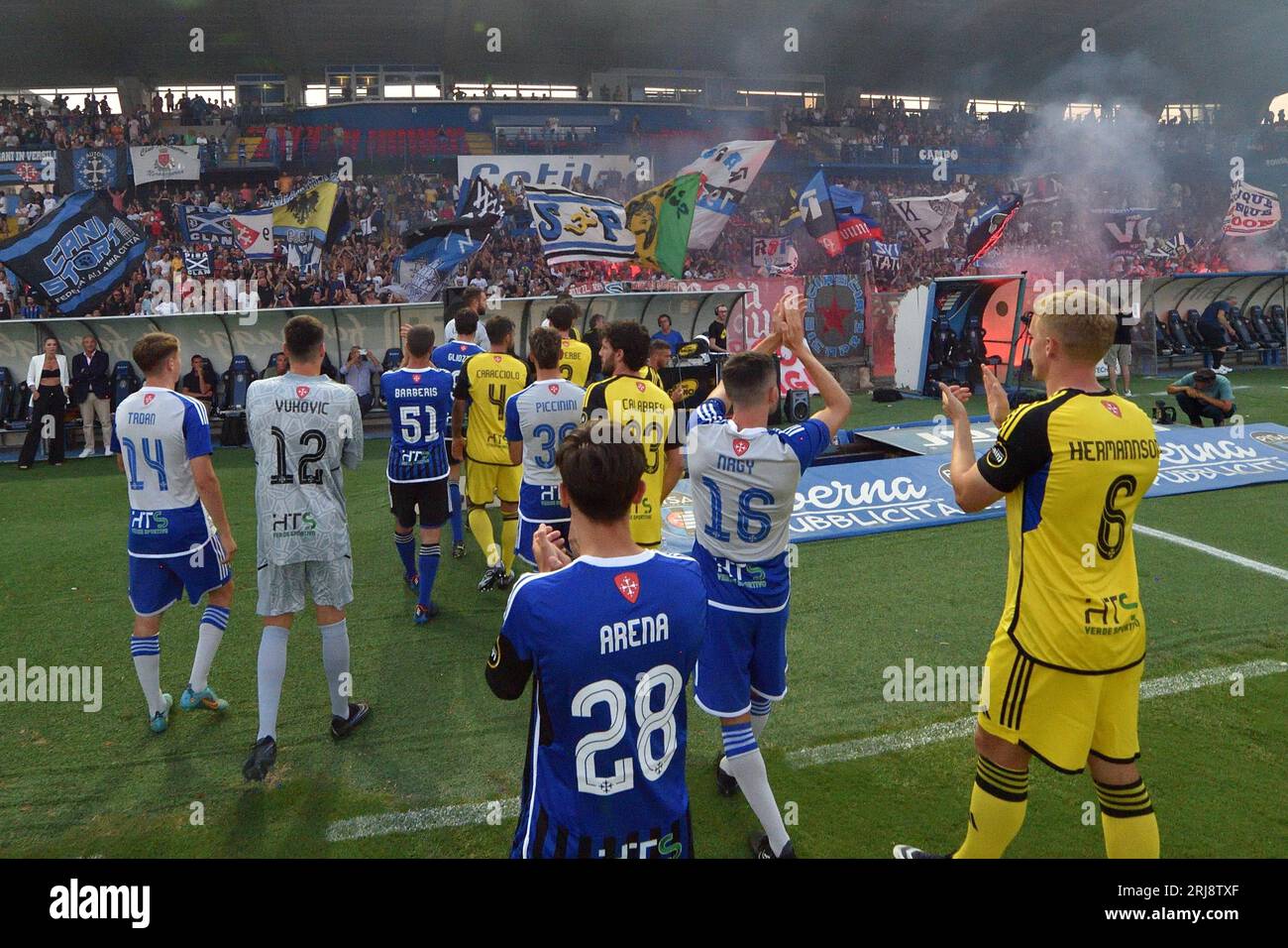 Pisa, Italy. 21st Aug, 2023. Players of Pisa greet their fans during ...