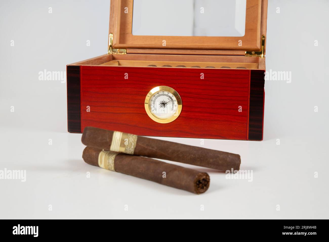 The two cigars and one cigar box isolated on a white backdrop Stock ...