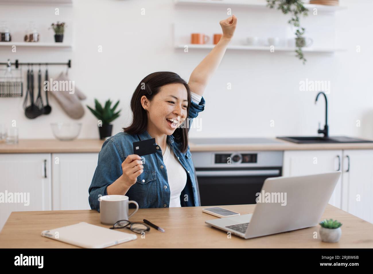 Excited business woman checking phone hi-res stock photography and ...