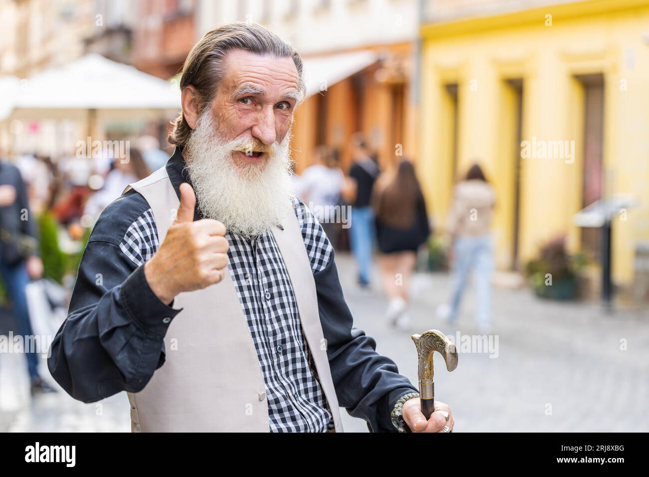 Like. Happy bearded senior old man looking approvingly at camera ...