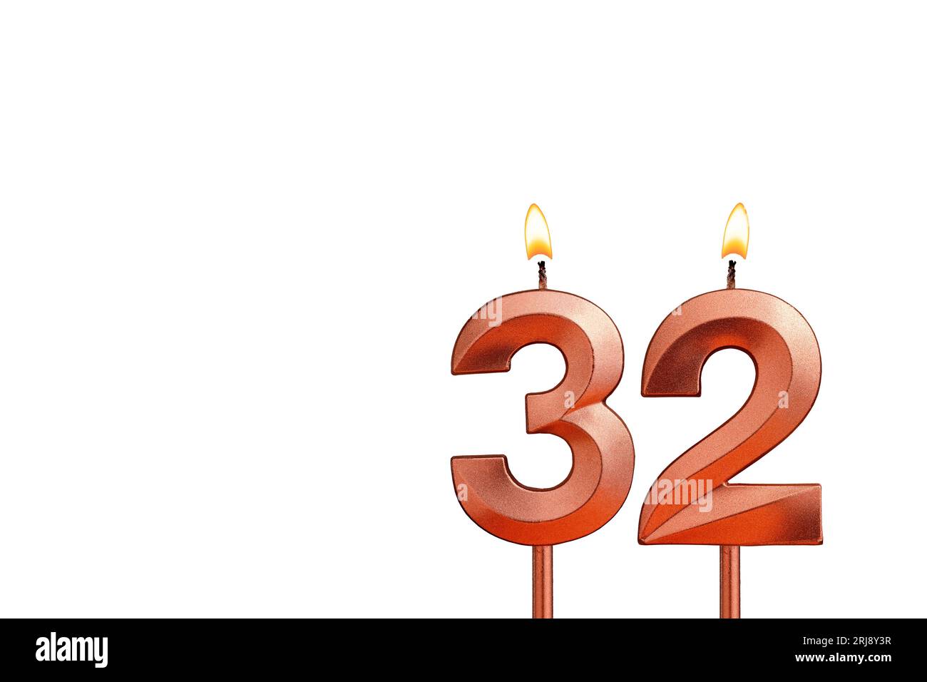 Burning candle number 32 for birthday on white background Stock Photo ...