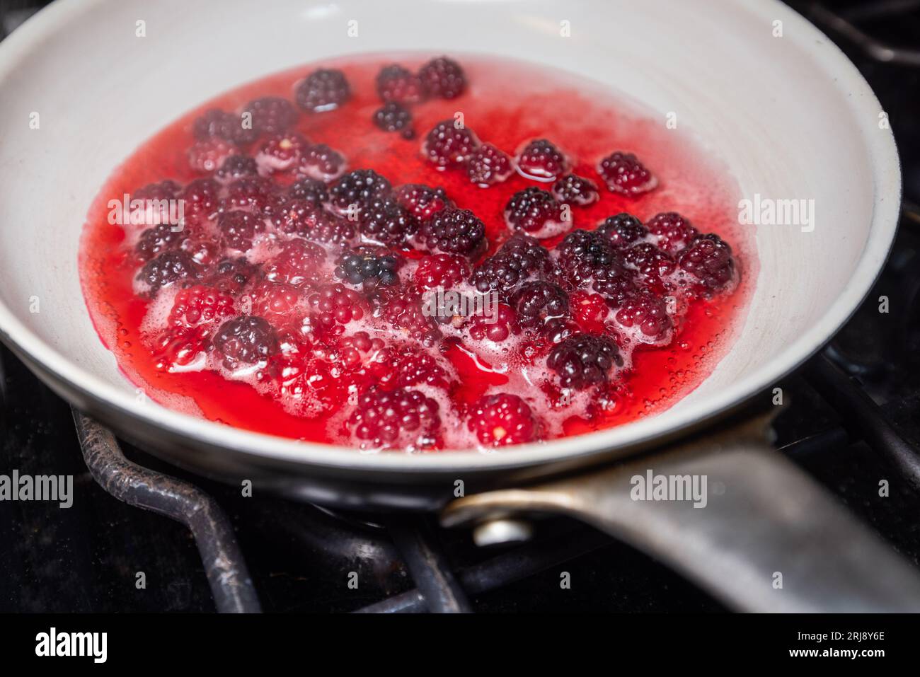 Cooking red berry compote foam hi-res stock photography and images - Alamy