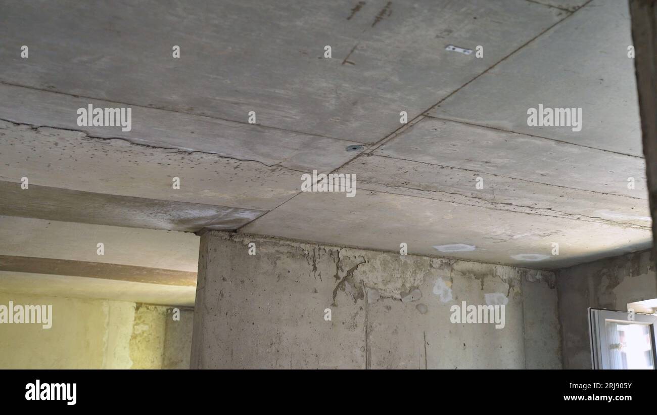 Gray ceiling in a new apartment, before renovation. The concept of ...