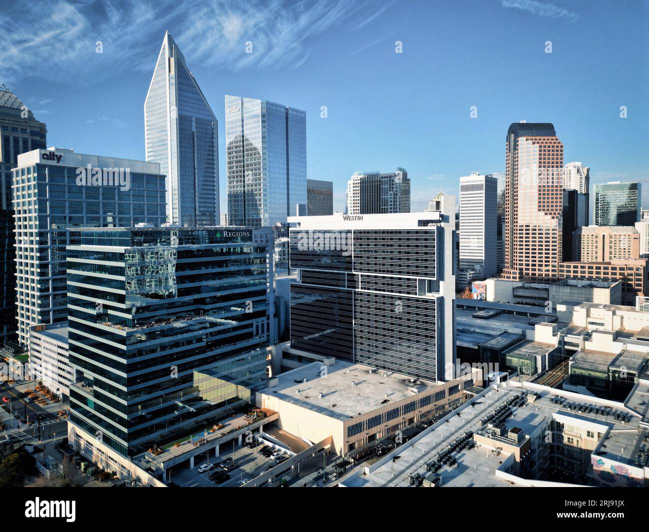 A stunning aerial view of a modern city skyline, featuring a dense ...