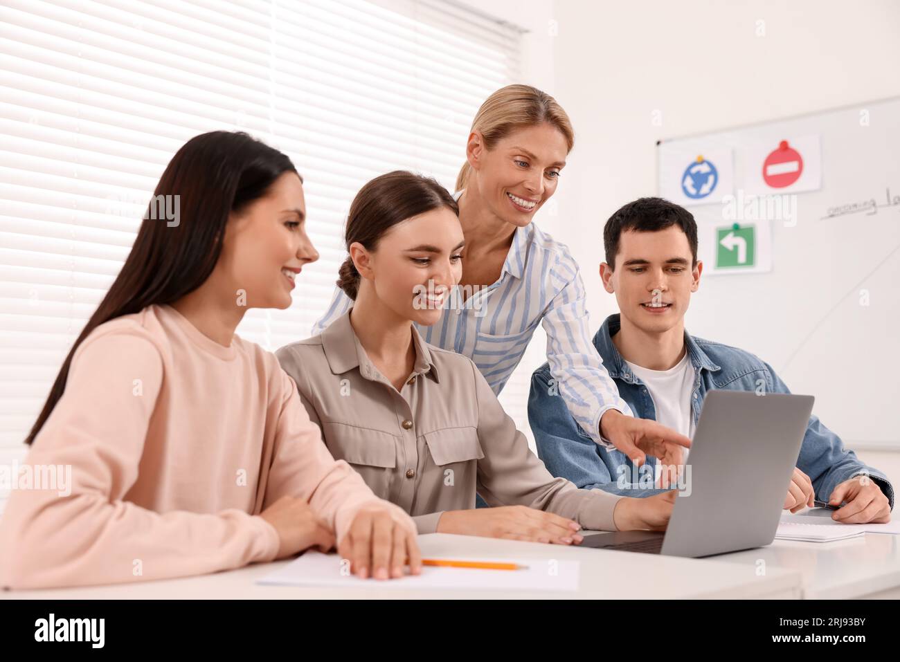 Teacher giving test class hi-res stock photography and images - Alamy