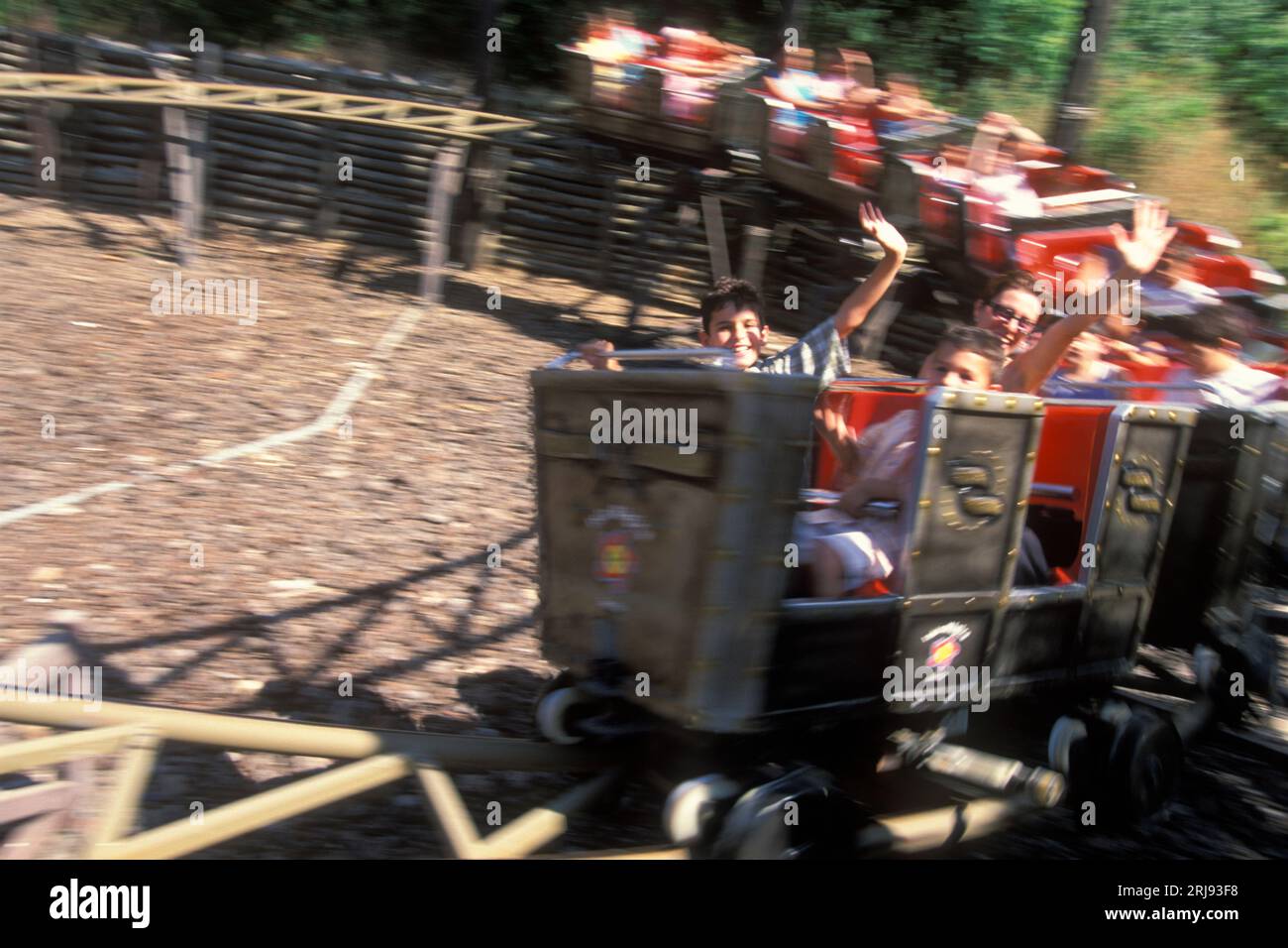 Boys enjoying ride at amusement park hi-res stock photography and ...