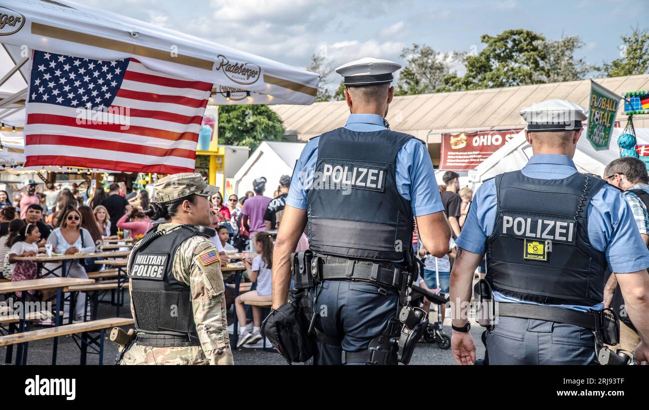 WIESBADEN, HESSE, GERMANY - 07-03-2023- Back of two German police ...