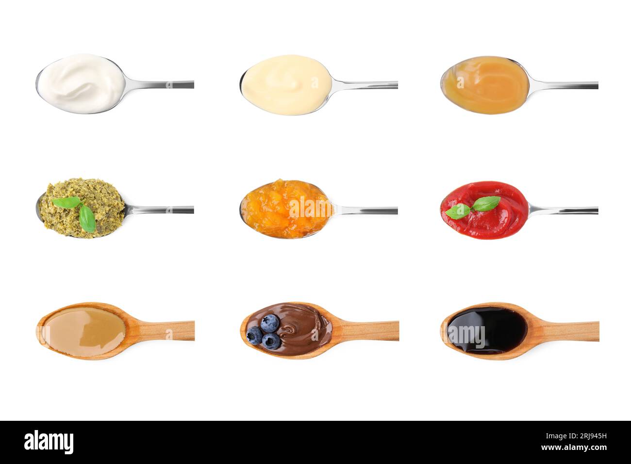 Set of spoons with different food isolated on white, top view Stock ...