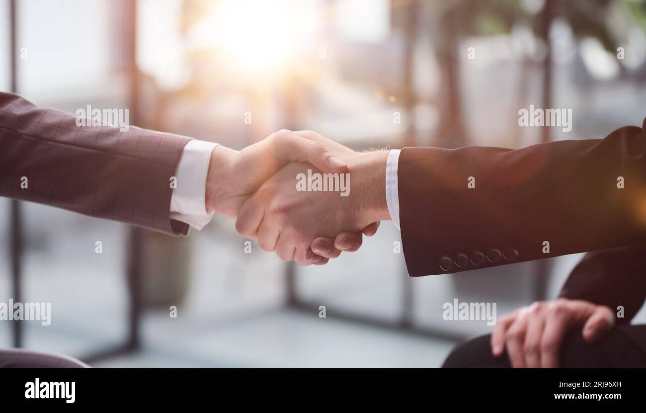 Employee shaking hands with boss hi-res stock photography and images ...