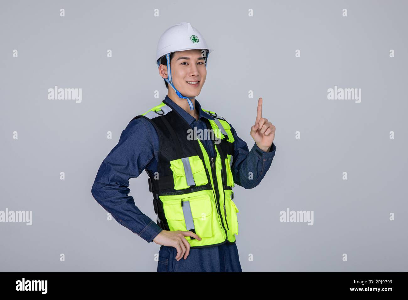 millennials and gen z, korean asian young man, site staff thinking with ...