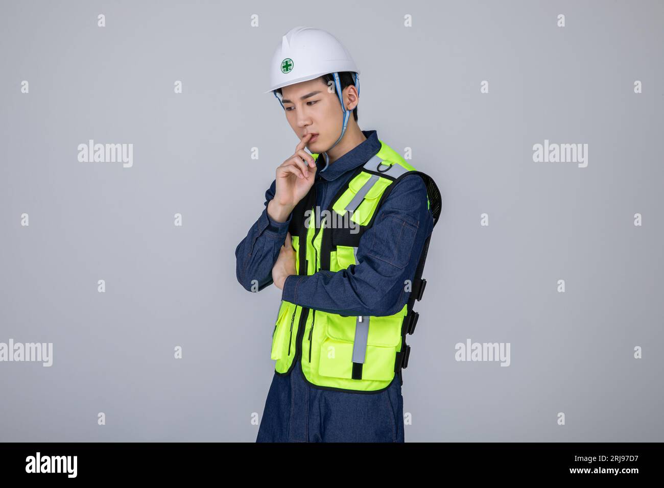 millennials and gen z, korean asian young man, site staff thinking with ...