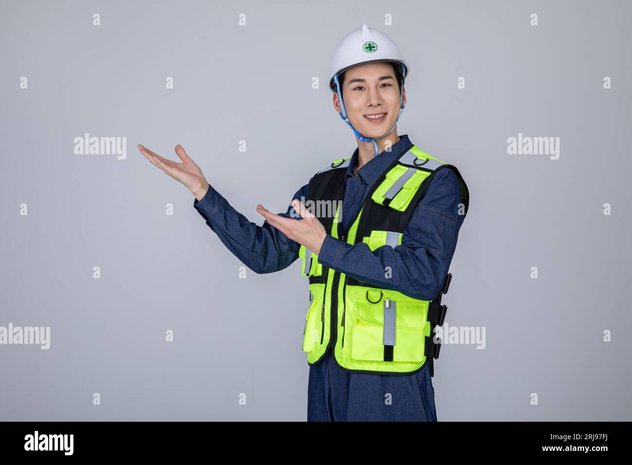 millennials and gen z, korean asian young man, site staff guiding Stock ...