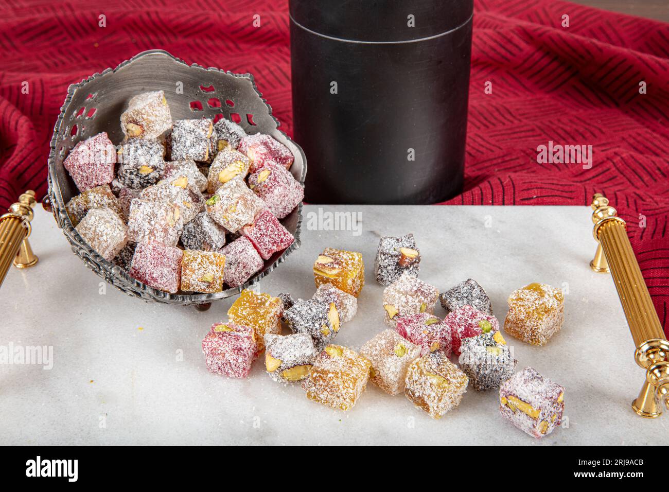 Turkish delight with pistachio and powdered sugar, carefully packed ...