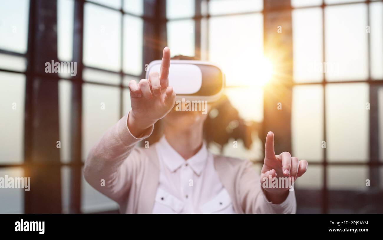 Office employee having fun at work, watching 3D video in virtual ...