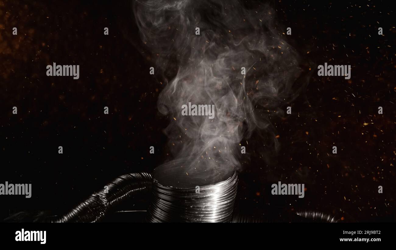 Burn smoke fire sparks floating fume ash duct pipe Stock Photo - Alamy