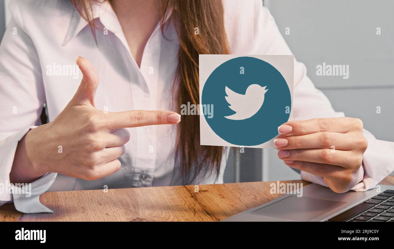 Twitter icon social media woman hands network logo Stock Photo - Alamy