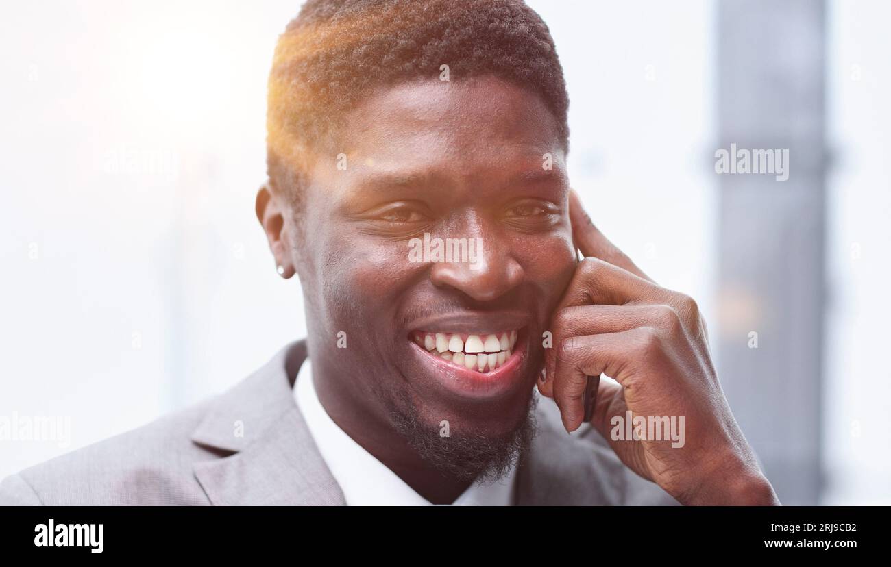 Portrait of a serious entrepreneur making a phone call Stock Photo - Alamy