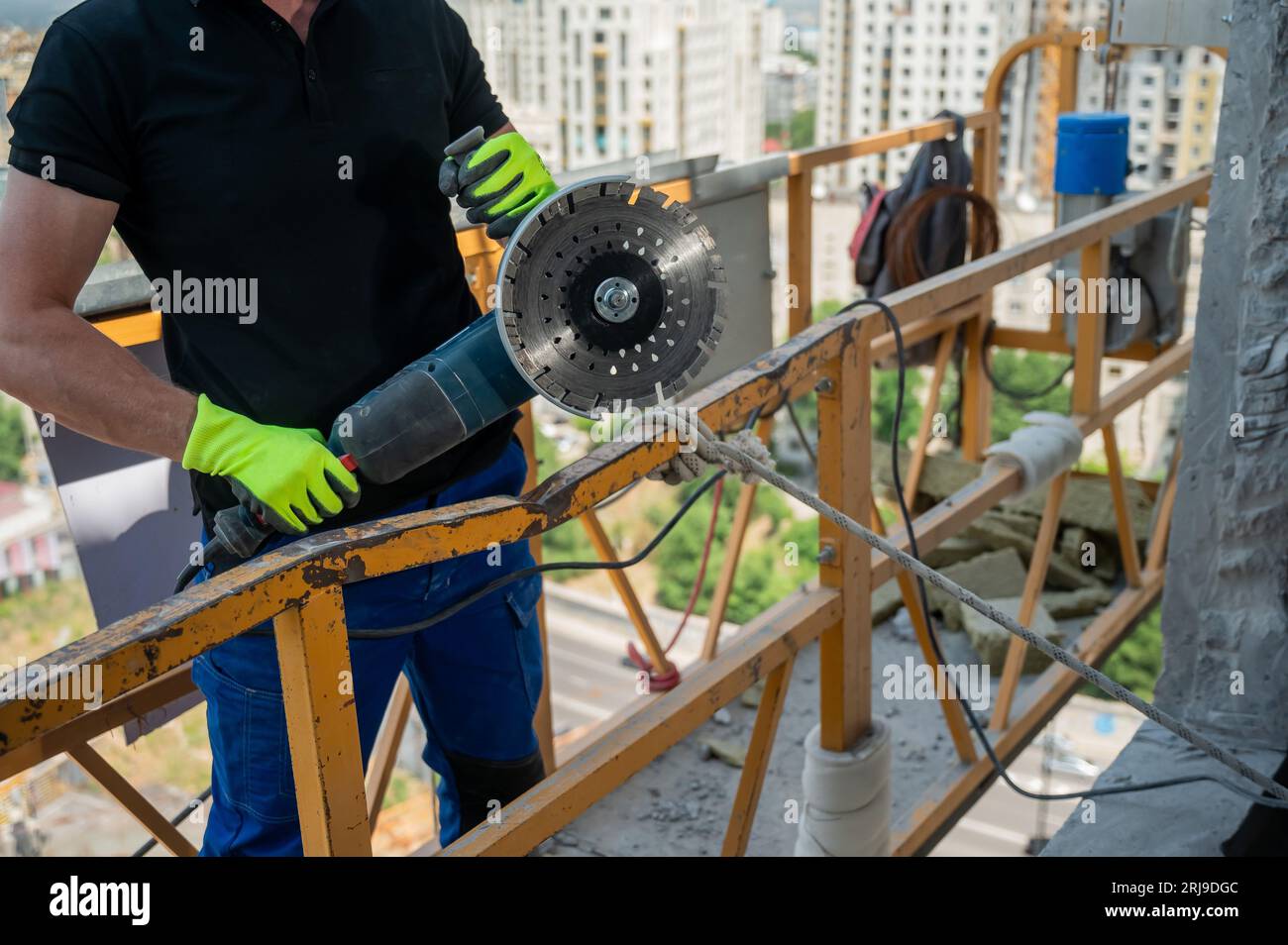 The master uses a diamond blade at a construction site Stock Photo - Alamy