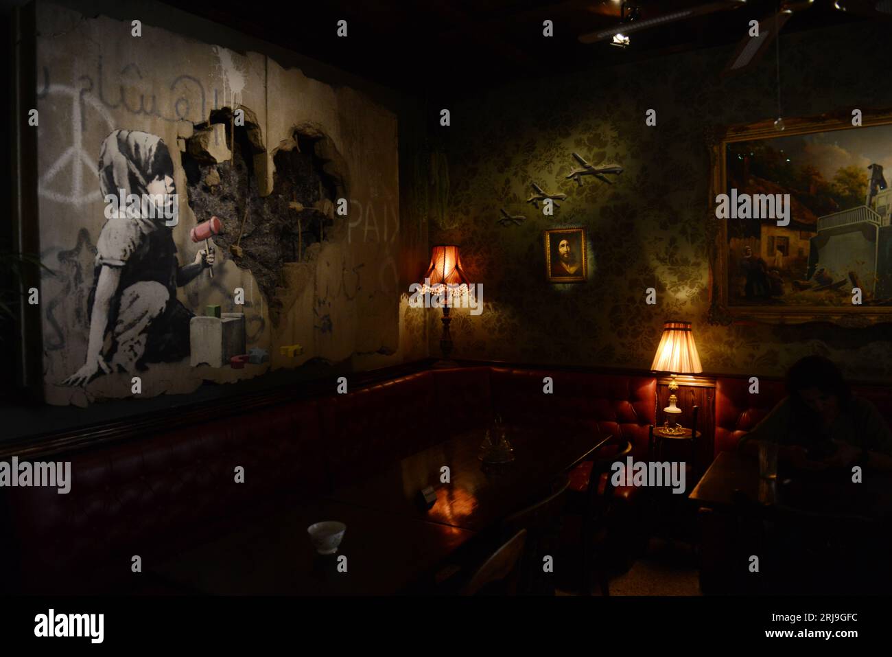 The Walled Off hotel by the separation wall in Bethlehem, Palestine ...