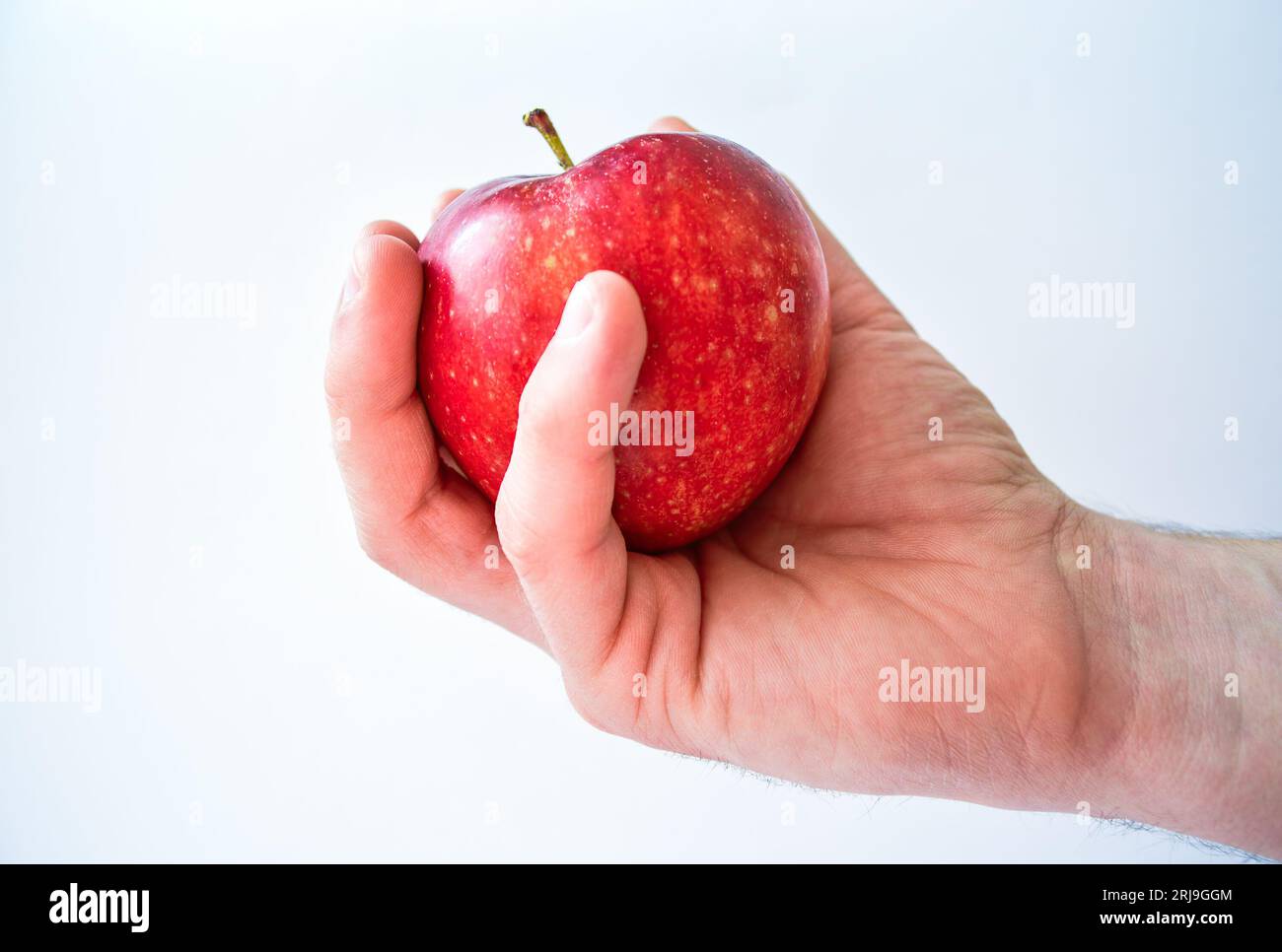 Hand apple hi-res stock photography and images - Alamy