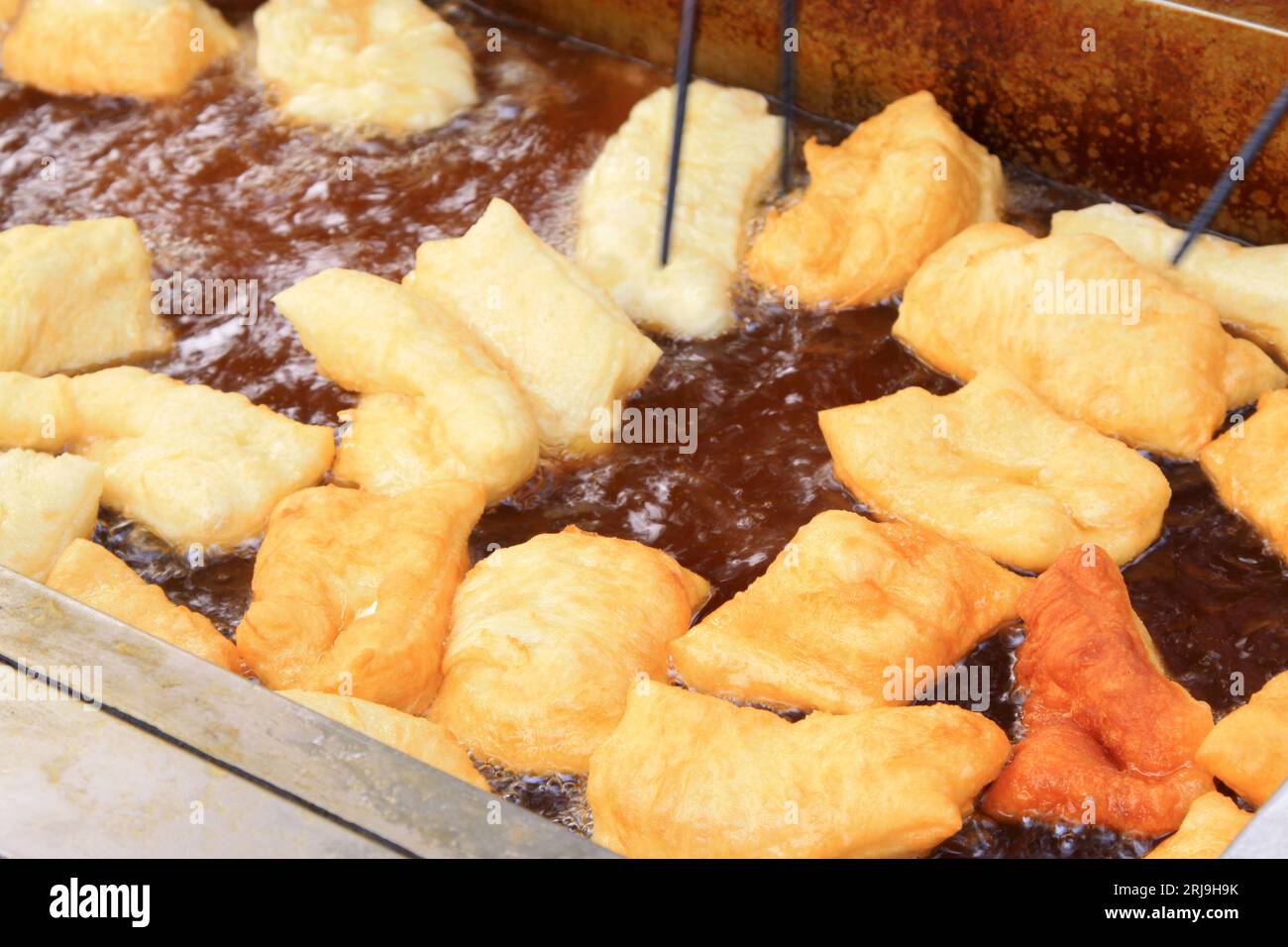 Fried foods in frying pan in a market, northern china Stock Photo - Alamy