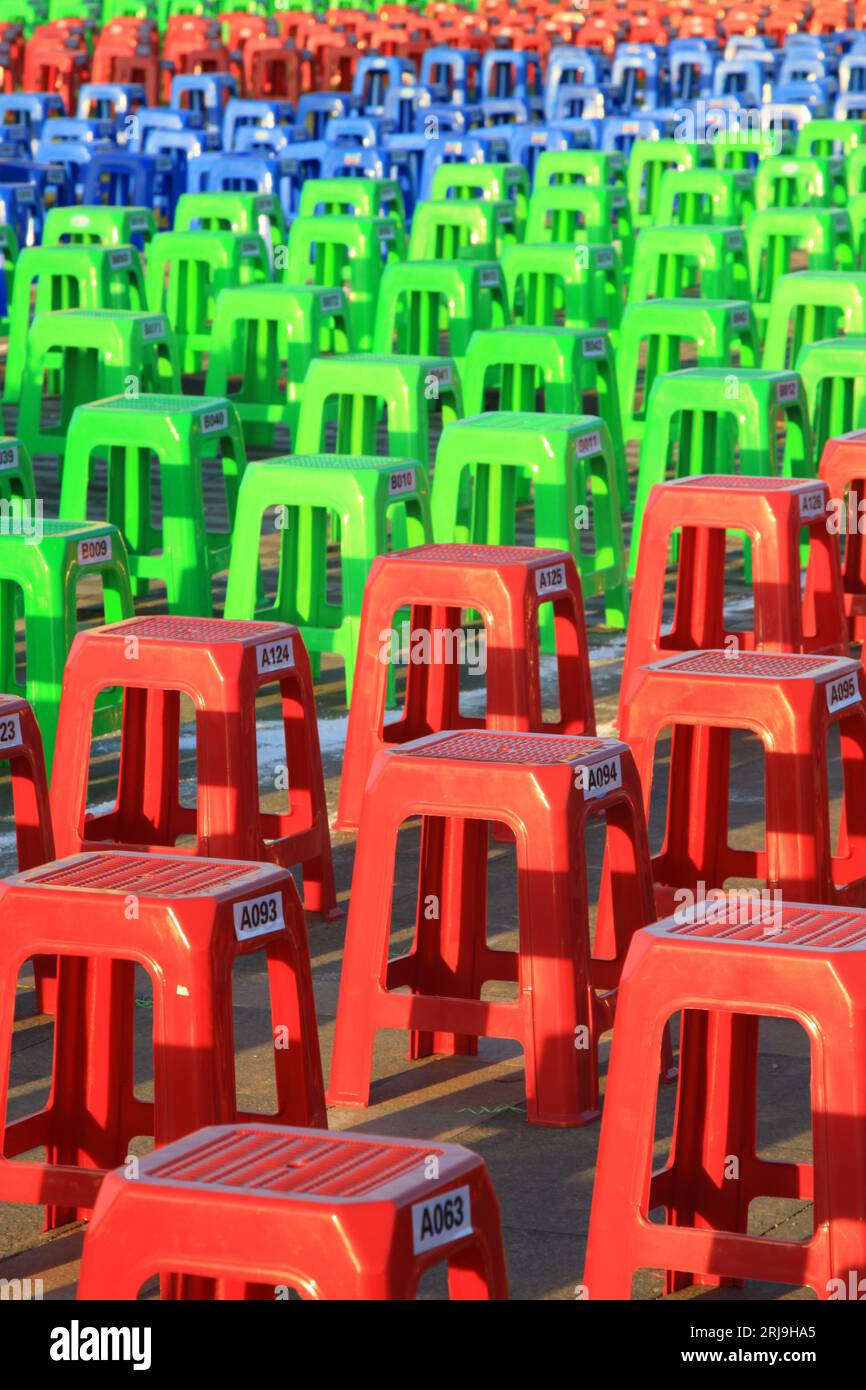 Plastic stools in the square in a park, north china Stock Photo - Alamy